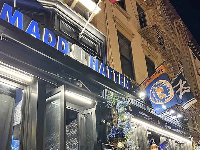 Bold blue signage lights up Washington Street like a beacon calling sports fans and hungry wanderers alike.
