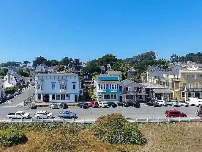 Coastal buildings perch above the Pacific like colorful sentries watching over their slice of paradise below.