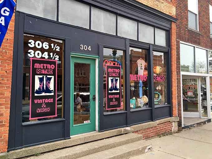 The vintage neon-pink signage on this brick building screams retro cool before you even step inside.