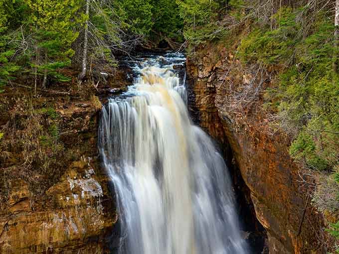 This wide cascade spreads across the rock face like nature decided to install the world's most dramatic shower curtain.