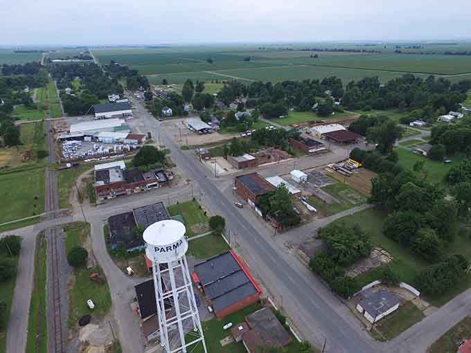 The water tower rises like a lighthouse on the prairie, guiding residents home to affordable living and friendly neighbors.