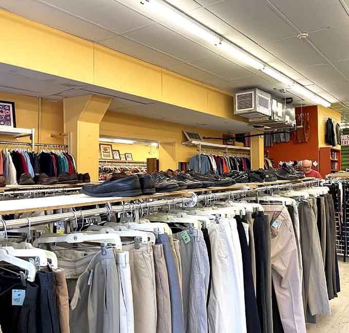 Rows of men's pants hang perfectly organized, making it easier than ever to find your size without the usual hunt.