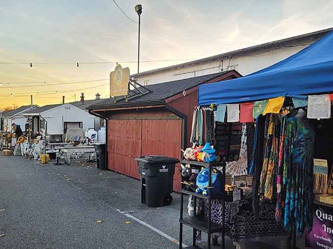 Golden hour casts magical light over vendor booths as the day winds down but the shopping continues strong.