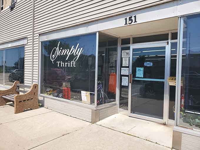 Clean storefront windows reveal glimpses of treasures within, inviting you to discover what small-town charm has been hiding.