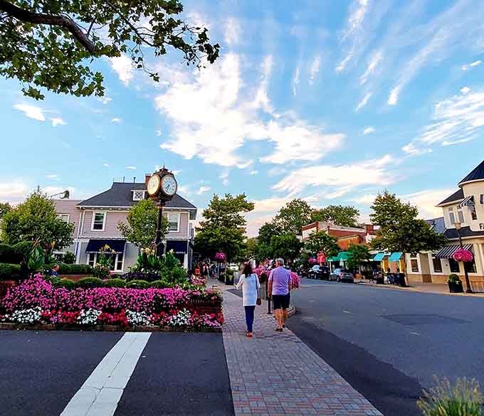 Spring Lake's evening glow transforms the town center into something magical, with flowers blooming like nature's own welcome mat.