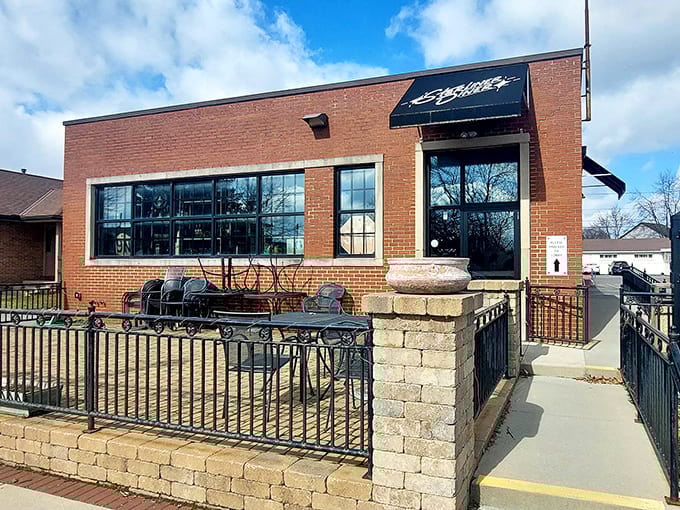 That inviting brick facade and stone-trimmed patio practically beg you to sit down and stay awhile for dinner.
