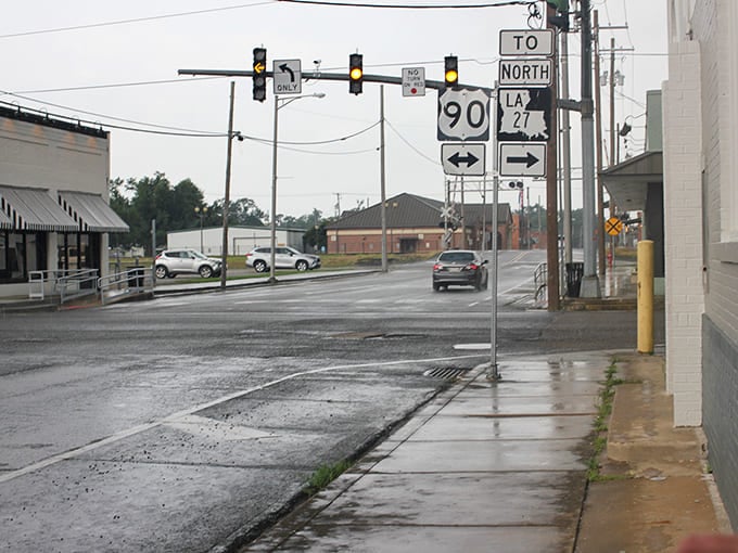 Sulphur's rain-slicked streets reflect the simple charm of this budget-friendly Louisiana gem. Where affordable living meets small-town character.