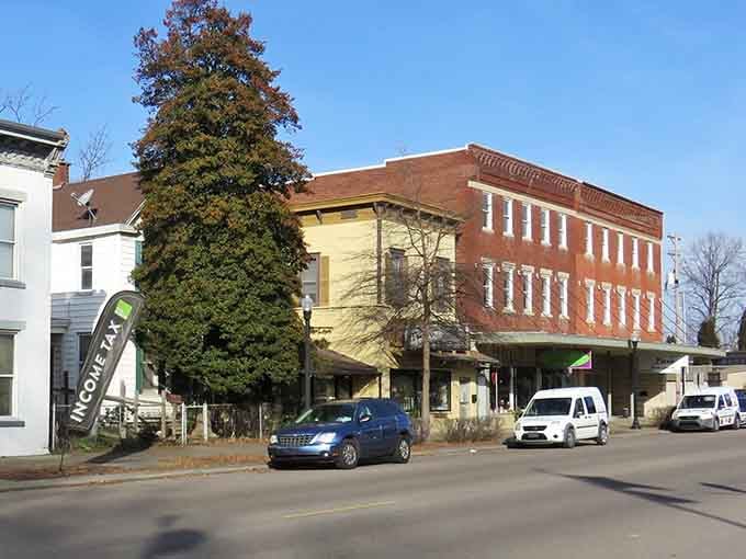 Autumn trees frame the downtown storefronts, nature's way of adding free decoration to an already picturesque scene.