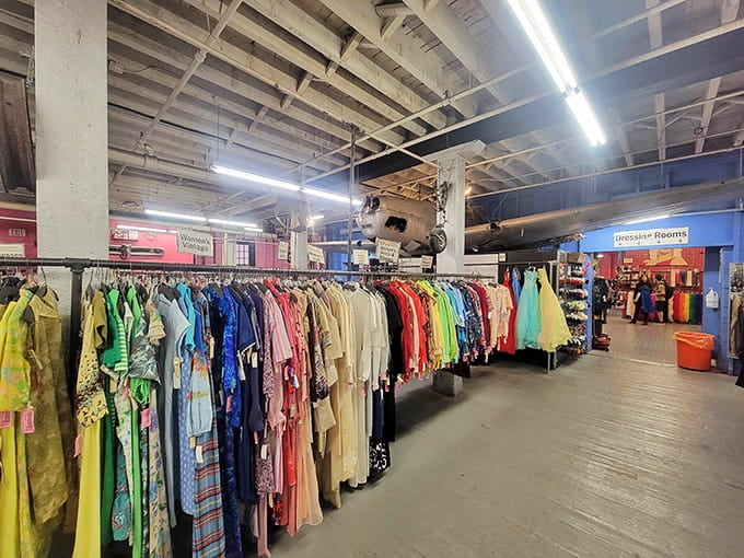 The rainbow of clothing stretching into the distance looks like Dorothy's wardrobe after visiting Oz&mdash;absolutely magical and endless.