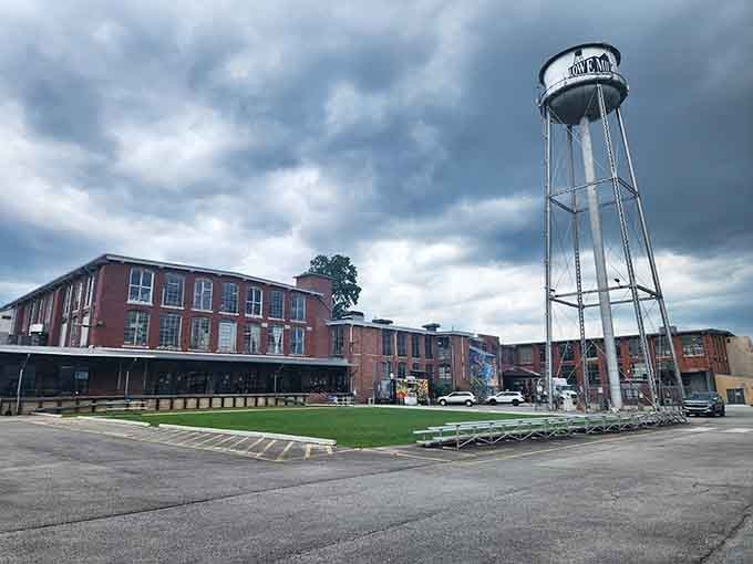 The water tower stands sentinel over converted industrial space, where manufacturing history meets modern music culture beautifully.