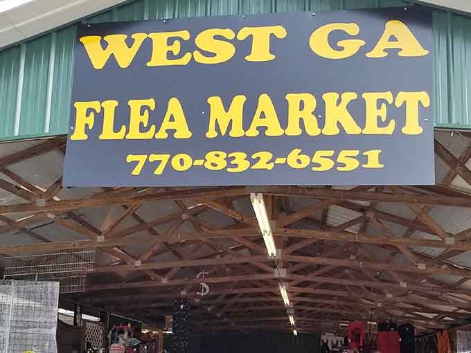 Bold yellow letters announce bargains await under that open-air pavilion where smart shoppers come to save money.