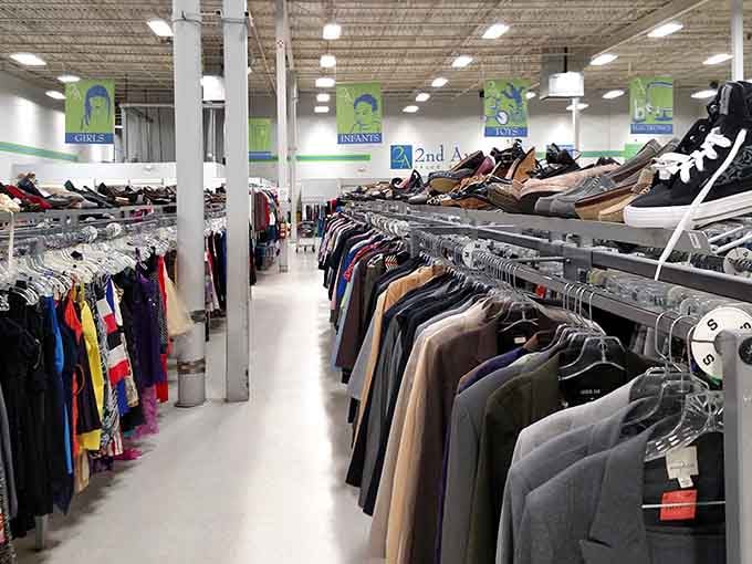 Organized aisles stretch toward the horizon, each rack holding potential wardrobe miracles waiting to be discovered by you.
