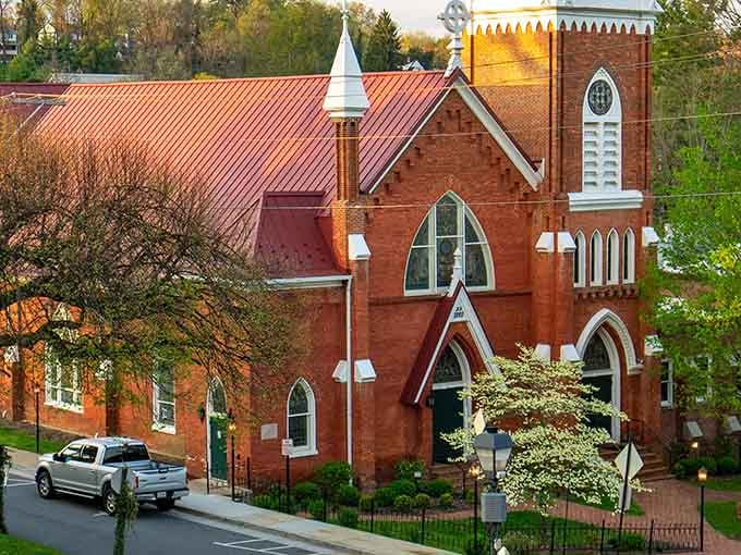 Gothic Revival architecture rises from the hillside, proving that beauty and faith built things to last back then.