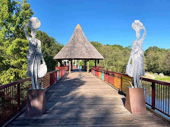 Colorful bridge railings frame this walkway like a rainbow leading to adventure ahead.