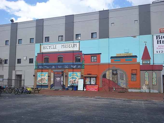 That colorful facade promises adventure inside, where two-wheeled history awaits around every corner and handlebar.