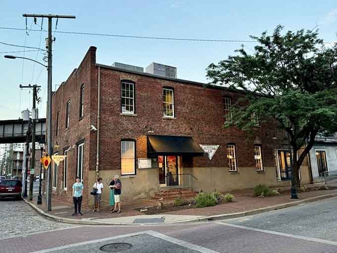 This historic brick building houses pizza legends that have survived floods and won Richmond hearts for good reason.