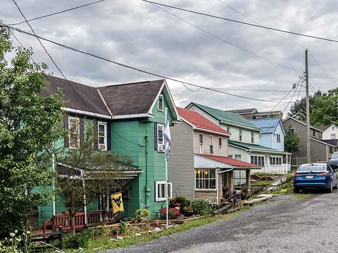 Colorful shops line the streets of Davis, where mountain air and outdoor adventures await just steps from these charming storefronts.