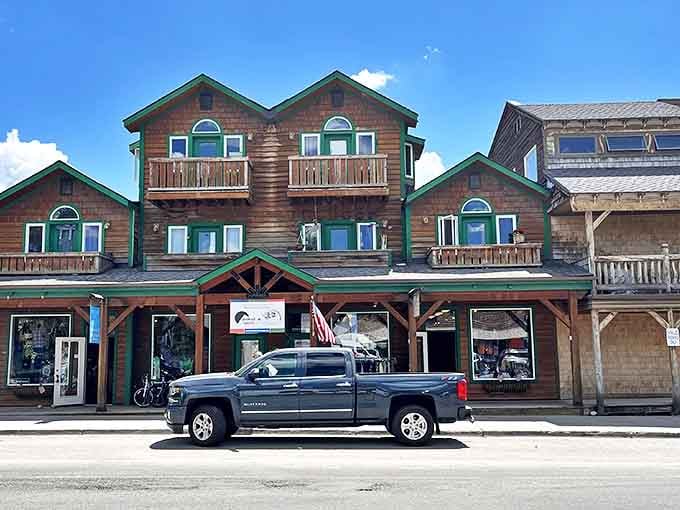 Explore the rustic charm of downtown Driggs, where beautiful wooden architecture and local shops await under a bright Idaho sky.