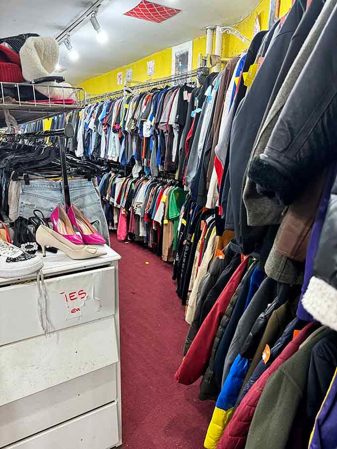 Packed racks in cheerful yellow create a rainbow of secondhand fashion that makes your closet jealous just looking.