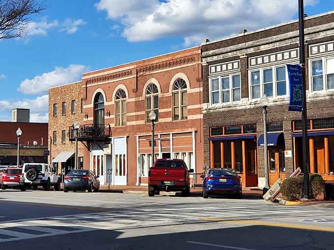 Arched windows and detailed brickwork showcase the architectural pride that defines this revitalized downtown district.