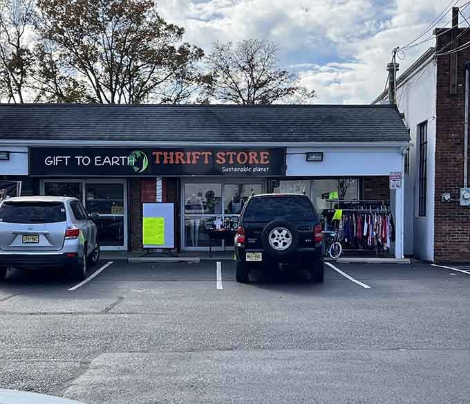 The brick facade and glass storefront create a welcoming neighborhood vibe where everyone knows the best deals drop on Thursdays.
