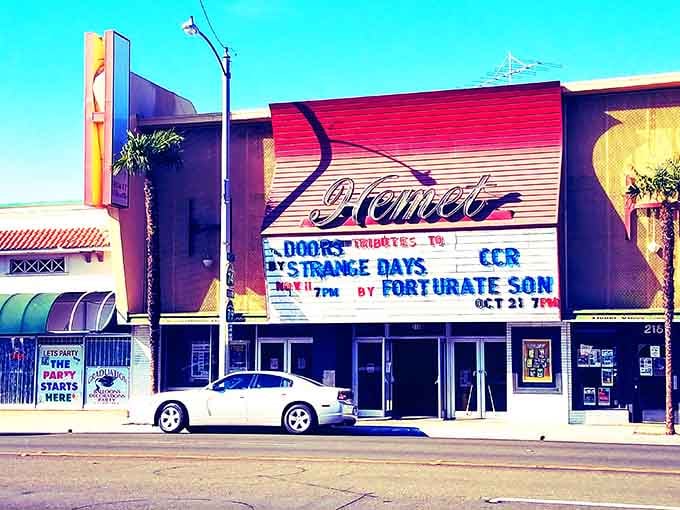 The vintage Hemet Theatre marquee glows with retro charm, promising entertainment like they made it decades ago.