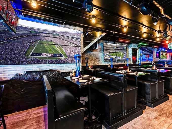 Giant screens and sleek booth seating turn game day into an immersive experience worth cheering about loudly.