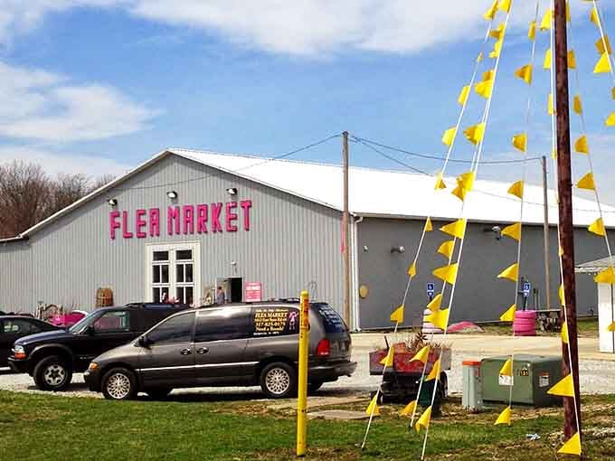 Yellow pennants flutter cheerfully in the breeze, beckoning bargain hunters to explore what waits inside this welcoming building.
