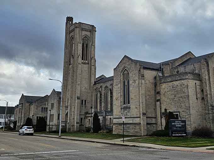 Gothic stonework and soaring towers anchor neighborhoods where history and community pride stand strong through every Michigan season.