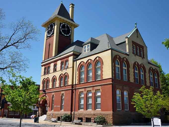 The clock tower rises majestically, keeping time for a town that clearly values both history and architectural beauty.