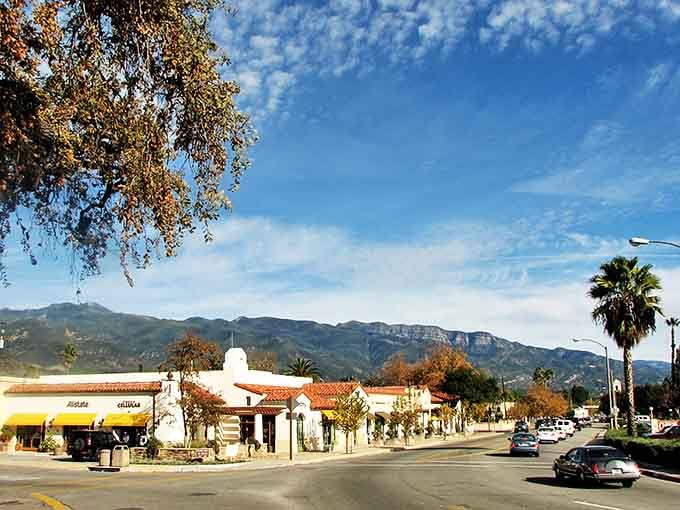 Ojai's Spanish-style architecture basks in the California sunshine, with mountains creating a perfect backdrop.