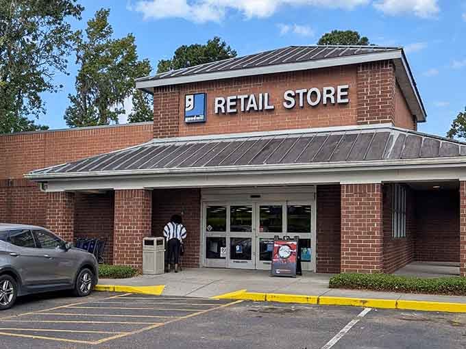 The welcoming entrance and professional signage make this feel more like upscale shopping than bargain hunting.