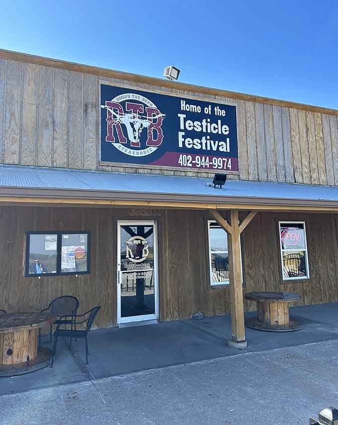 This rustic roadside spot serves up steaks with a side of quirky Nebraska charm. The sign alone is worth the drive!