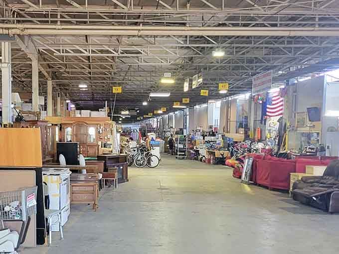 Natural light streams through the entrance, illuminating rows of furniture waiting for their second act.