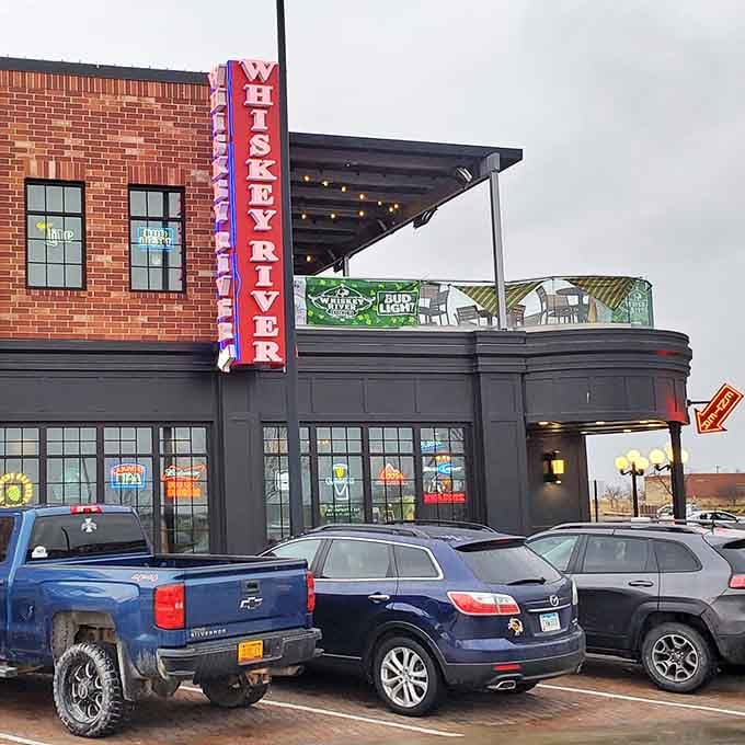 Brick, neon, and breaded pork perfection - Whiskey River dresses up the humble tenderloin without losing its soul.