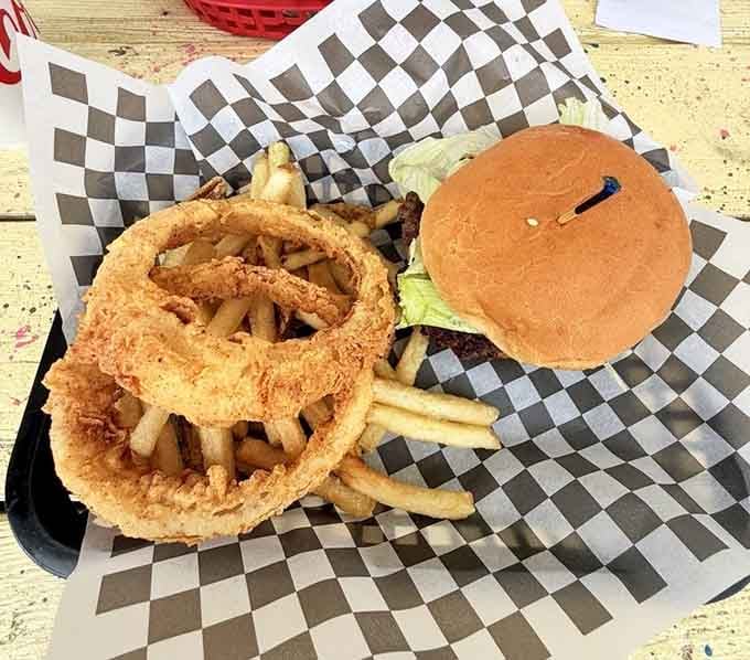 When your burger comes with onion rings this perfectly golden, you know someone in that kitchen truly cares.