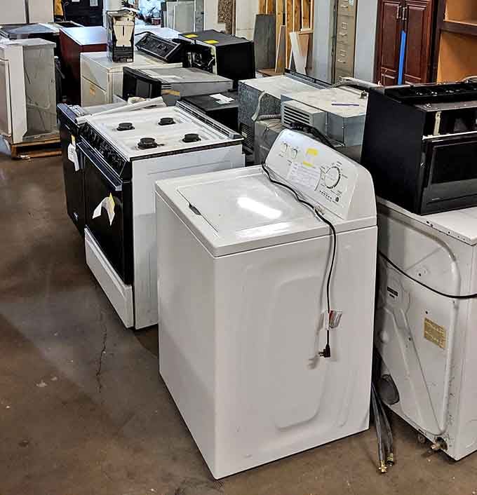 The appliance section: where refrigerators, stoves, and washers stand at attention, ready for their next tour of duty.