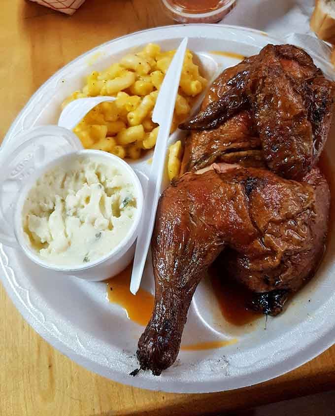 Half a chicken with mac and cheese proves that sometimes the simplest combinations create the most satisfying meals.
