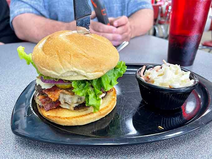 This burger isn't concerned with Instagram fame; it's too busy delivering honest-to-goodness flavor with that perfect meat-to-bun ratio.