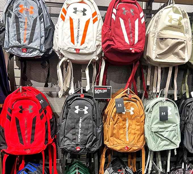 Under Armour backpack heaven&mdash;where school supplies meet weekend adventures. Half-off tags are the universal language of "treat yourself."