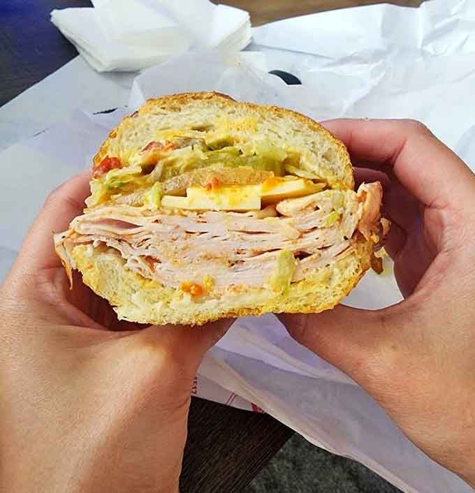 Turkey never looked this good&mdash;stacked high with fresh vegetables on bread that could make Wonder Bread weep.