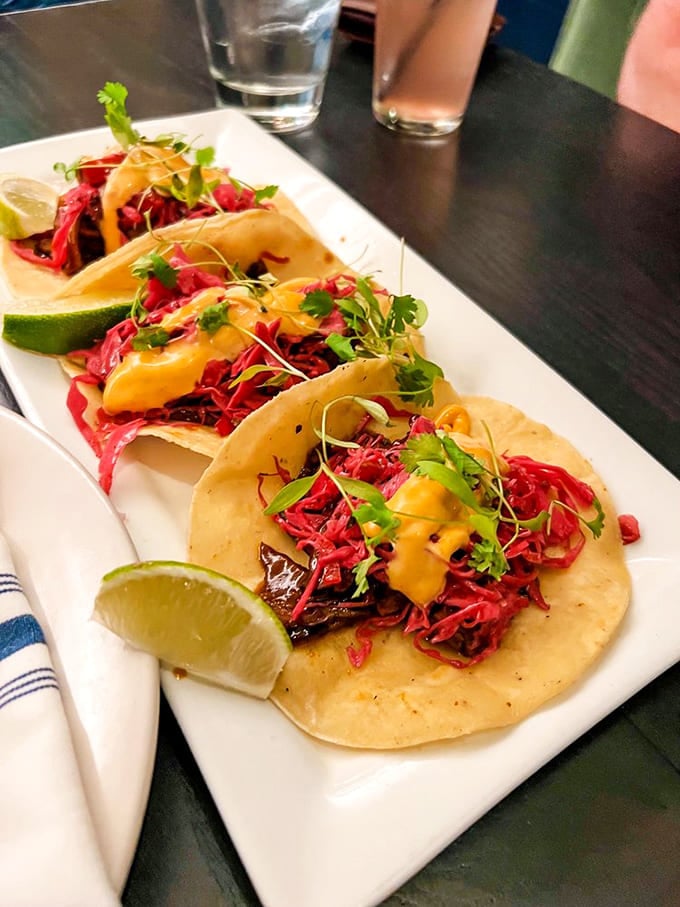 These aren't your average Tuesday night tacos. The vibrant slaw and sauce elevate these handheld treasures to "worth-getting-dressed-up-for" status.