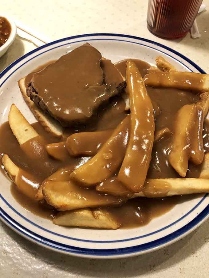 That open-faced roast beef sandwich with gravy and fries looks like comfort food's greatest achievement.