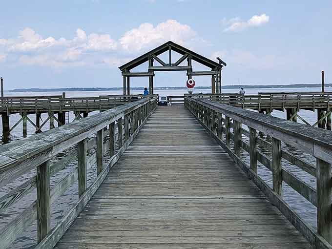 The pathway to tranquility. This wooden pier stretches toward the horizon, inviting visitors to walk just a little farther from everyday worries.