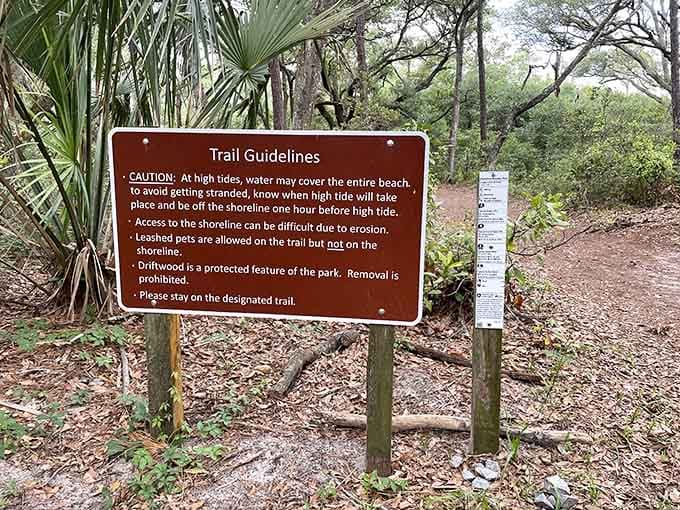 Trail guidelines reminding you that high tide waits for no one, not even Instagram influencers.