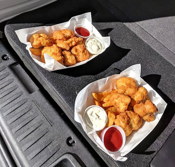 Two orders of happiness served in paper boats, because irony is delicious when it's this crispy.