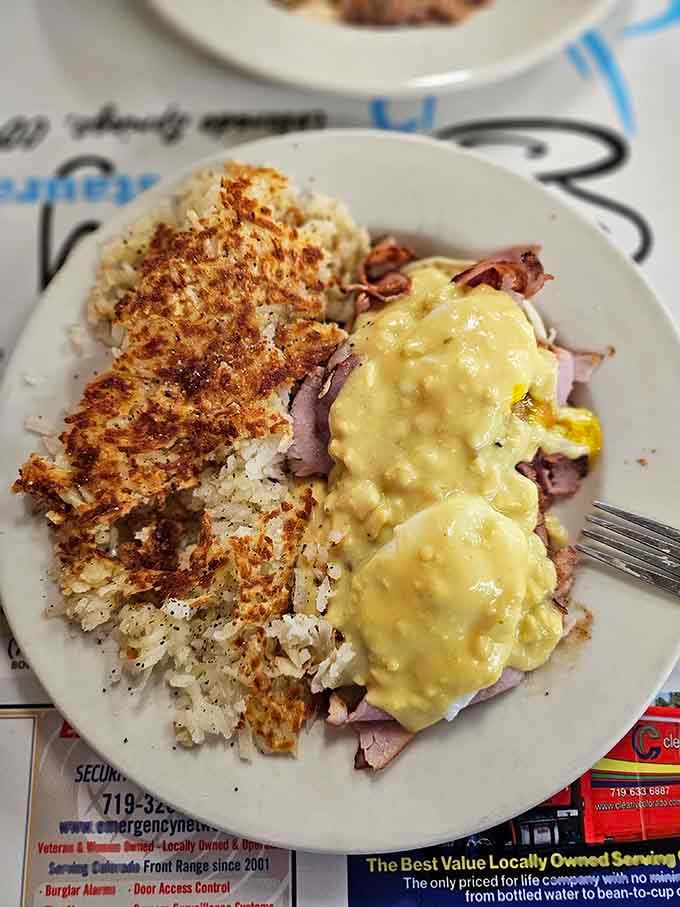 Crispy hash browns meet eggs and ham in this breakfast plate that's less about Instagram and more about pure, unadulterated satisfaction.