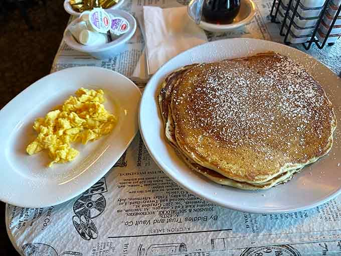 Pancakes the size of dinner plates dusted with powdered sugar, because portion control is for quitters.
