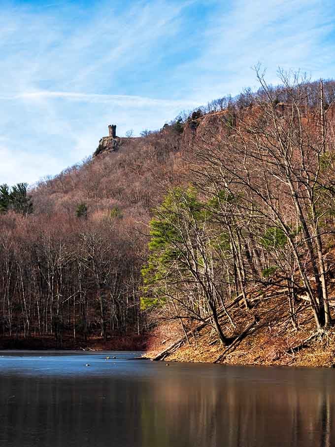 From Mirror Lake below, the tower perches like a sentinel watching over Meriden's peaceful waters.