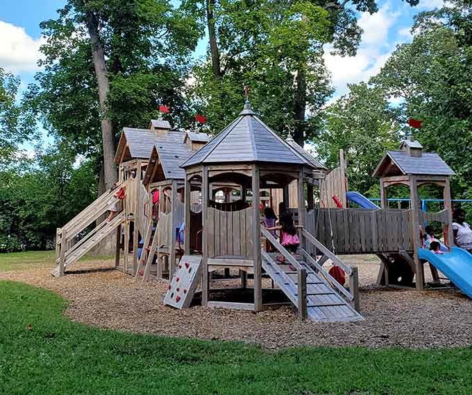 The playground proves that even medieval-inspired estates understand the importance of keeping the grandkids entertained and exhausted.